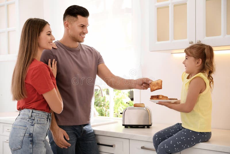 Happy Family Using Modern Toaster in Kitchen Stock Photo - Image of ...
