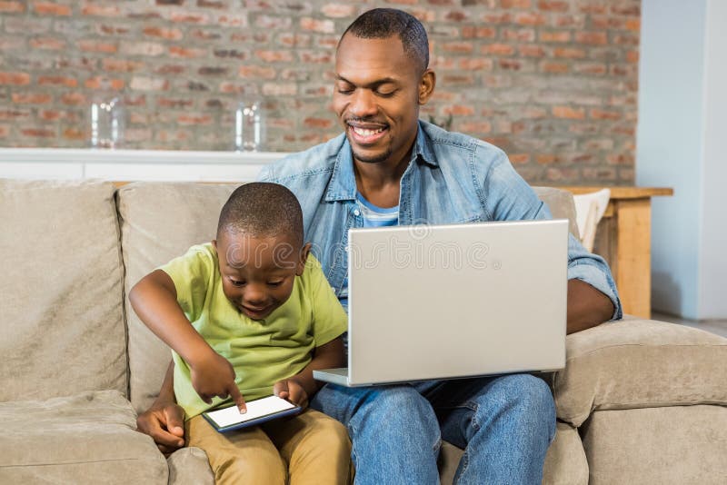 Happy Family Using Technology Together Stock Photo - Image of living ...