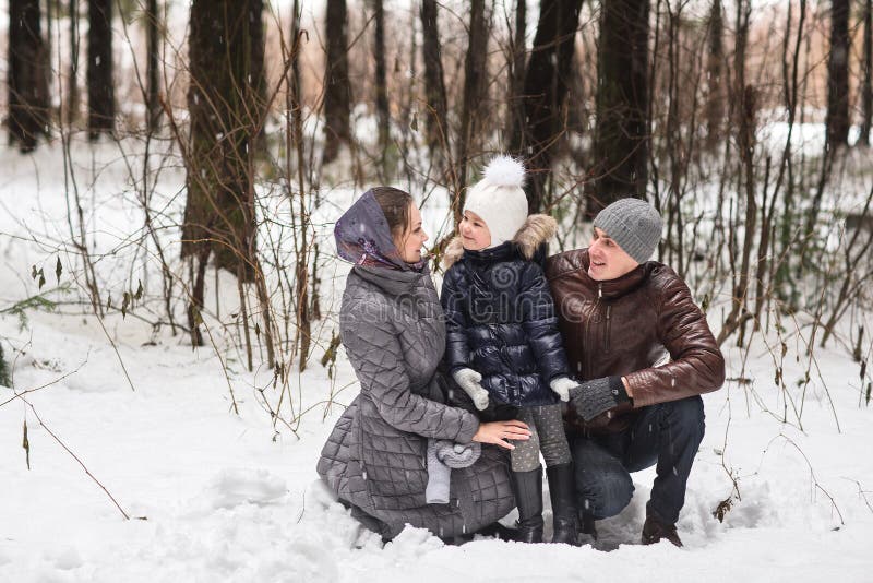 Happy Family Walking in a Winter Park. Stock Image - Image of family ...