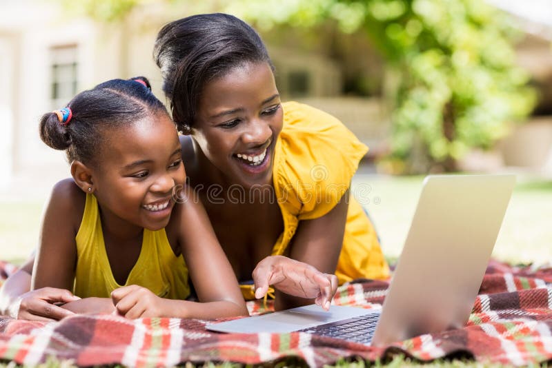 Happy Family Watching a Laptop Stock Photo - Image of entertaining ...