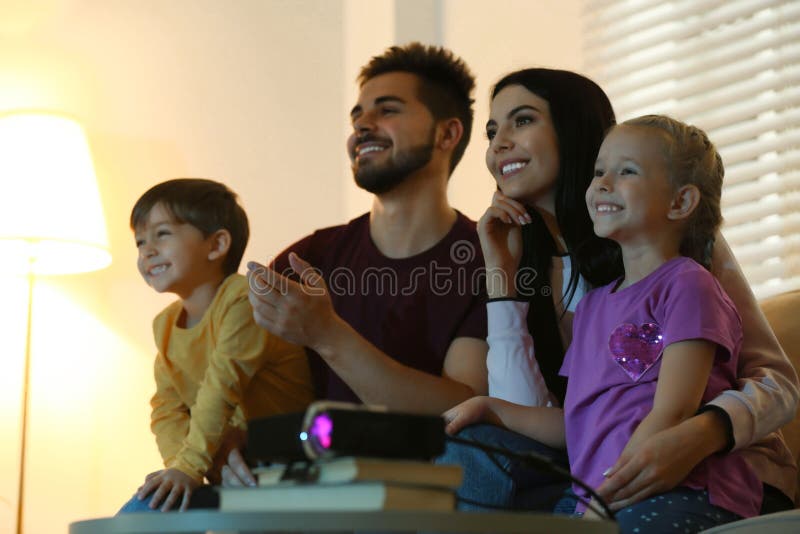 Family Watching Movie Using Video Projector Stock Image - Image of ...