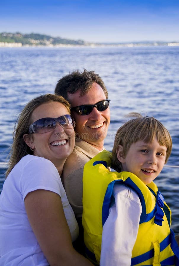 Happy family on water stock image. Image of sailing, vest - 3060411