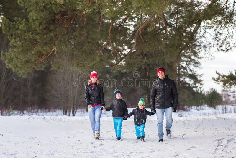 Happy Family in the Winter Forest. Stock Image - Image of daddy, cold ...