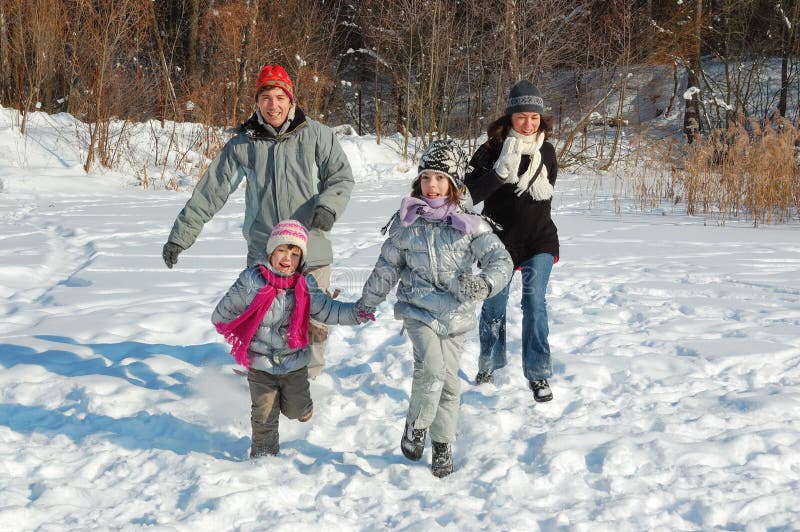 Happy Family in Winter, Having Fun with Snow Outdoors Stock Image ...