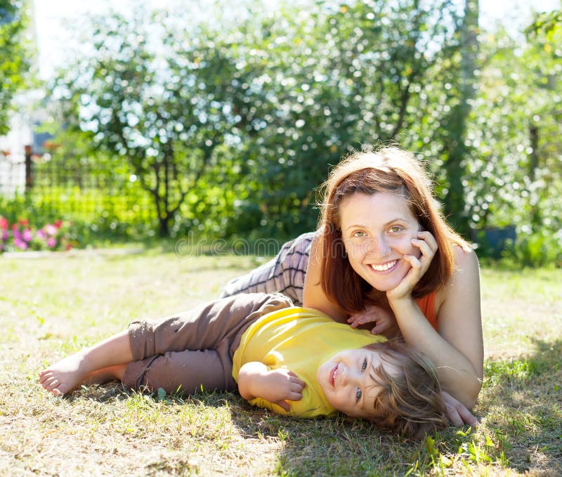 Happy family in yard stock photo. Image of female, casual - 25785748