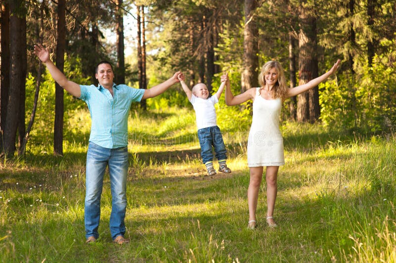 Happy family stock photo. Image of happy, nature, lawn - 33023148