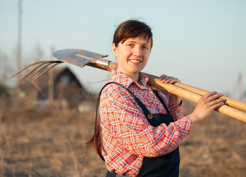 Happy farmer in rural stock photo. Image of village, pitchfork - 19384622