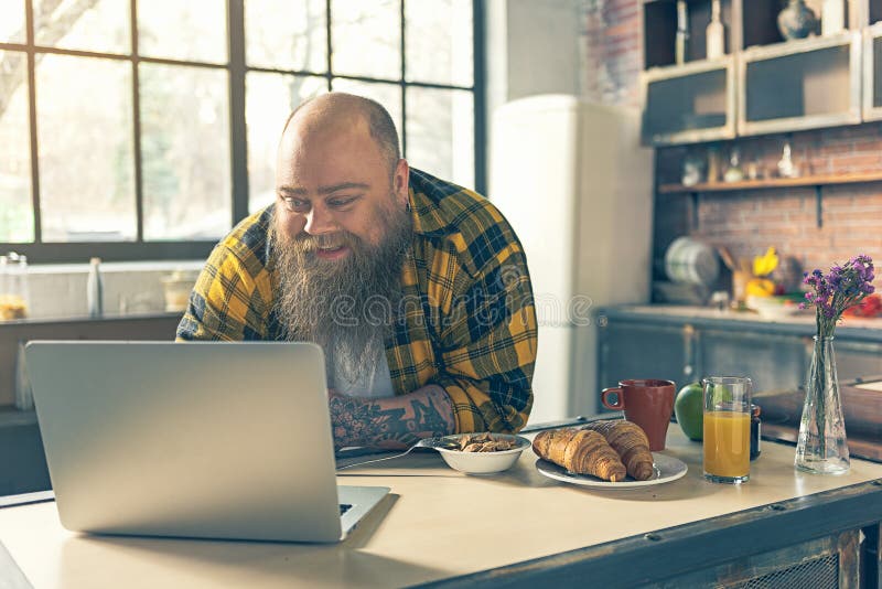 Happy Fat Man Using Computer in Cook Room Stock Photo - Image of cook ...