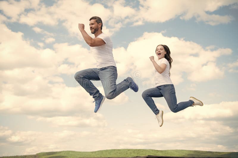 Happy Father and Daughter Jump in Sky. Hurry Up Stock Photo - Image of ...