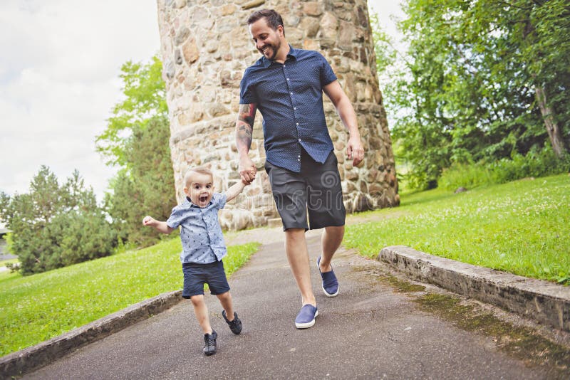Happy Father Having Fun with His Son on the Park Stock Photo - Image of ...