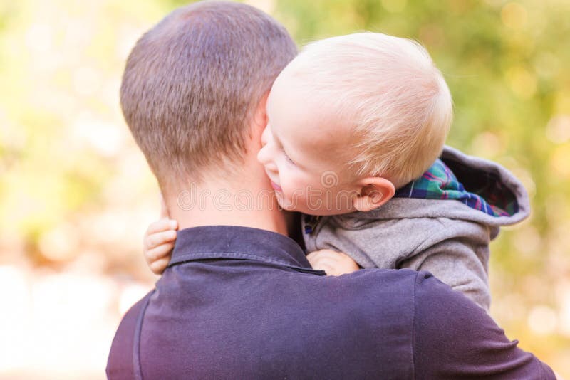 Happy Father and His Son Outdoors. Child Hugging Daddy. Stock Image ...