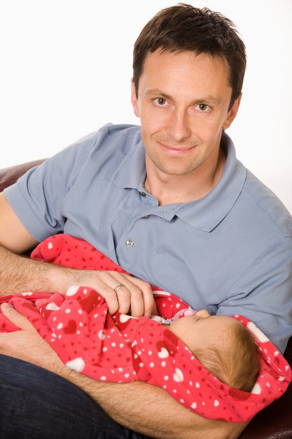 Happy father holds baby stock image. Image of bonding - 12573825