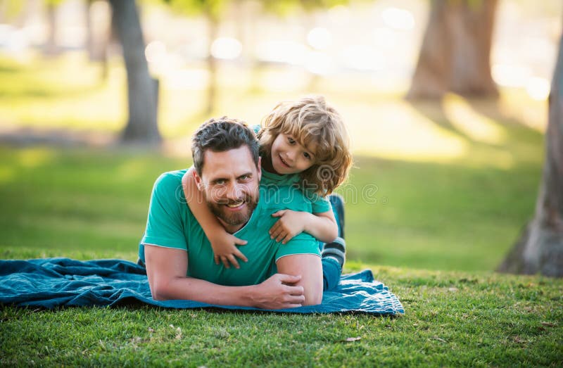Happy Father and Little Boy Son Walking in Summer Park. Stock Photo ...