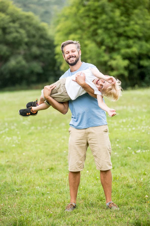 Father and Son Having Fun Together Stock Image - Image of cheerful ...