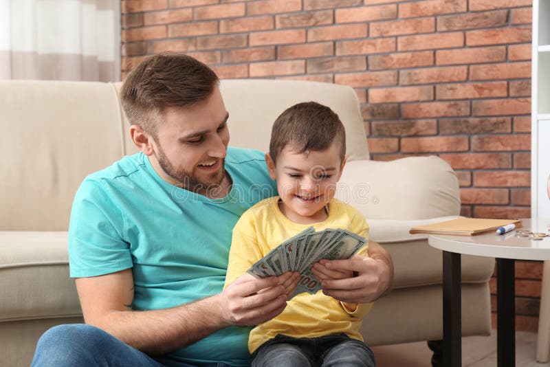 Happy Father and Son with Money Stock Image - Image of economy, credit ...