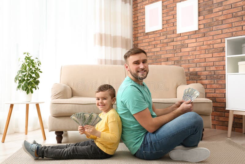 Happy Father and Son with Money Stock Image - Image of finance, floor ...