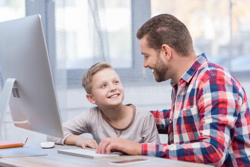 Father and Son with Desktop Computer Stock Image - Image of ...
