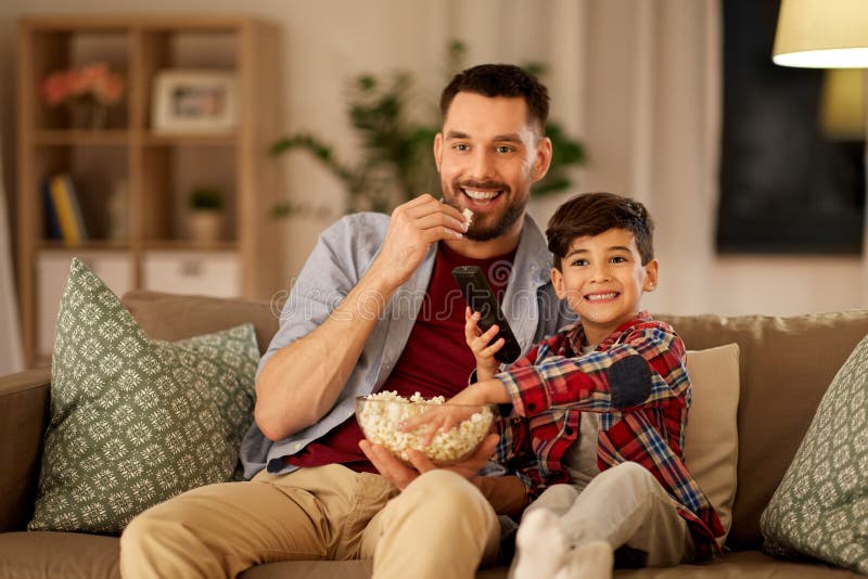 Happy Father And Son Watching Tv At Home Stock Image Image Of Beard