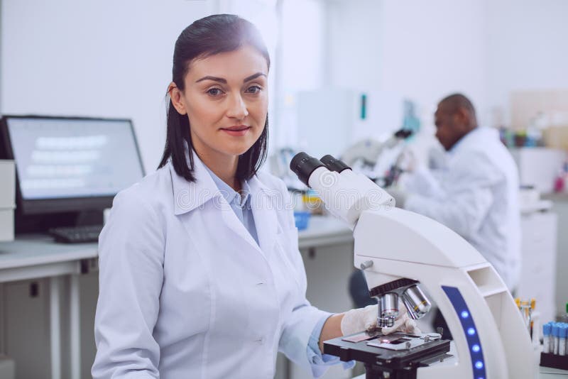 Happy Biologist Touching The DNA Model And Smiling Stock Image - Image ...
