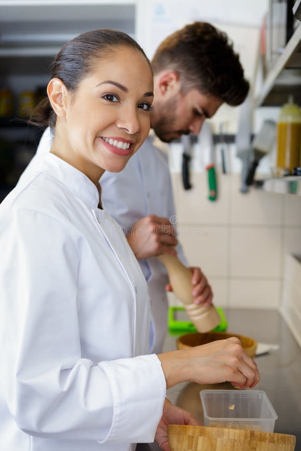 Happy female chef at work stock image. Image of carb - 272190973