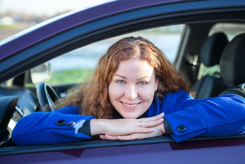 Happy woman driver in car stock image. Image of looking - 29880953