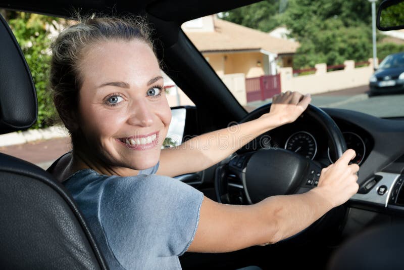 Happy Female Driver Smiling at Camera Stock Image - Image of pretty ...