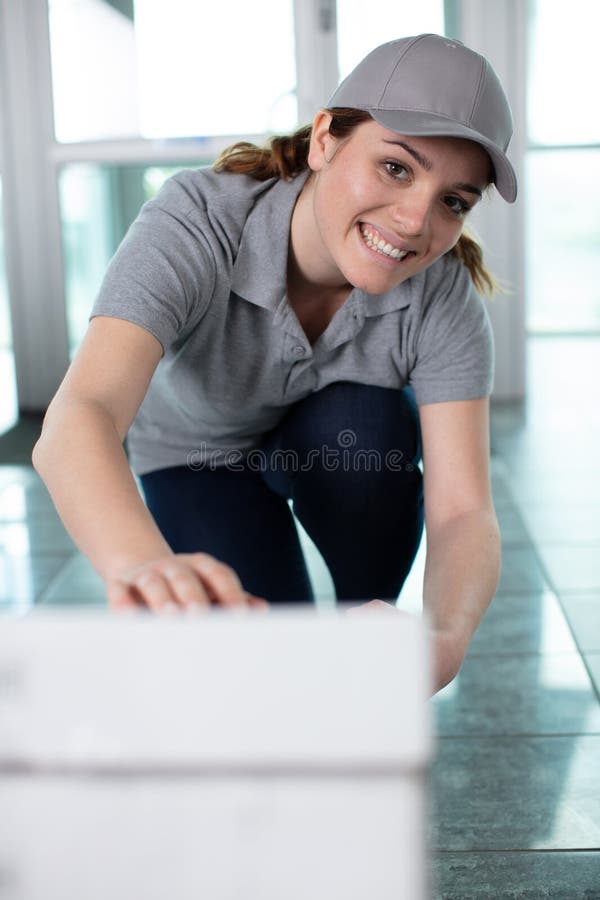 Happy Female Janitor Cleaning Floor Stock Photo - Image of cleaning ...