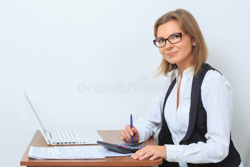 Happy Female Office Worker Sits at Her Desk and Stock Image - Image of ...