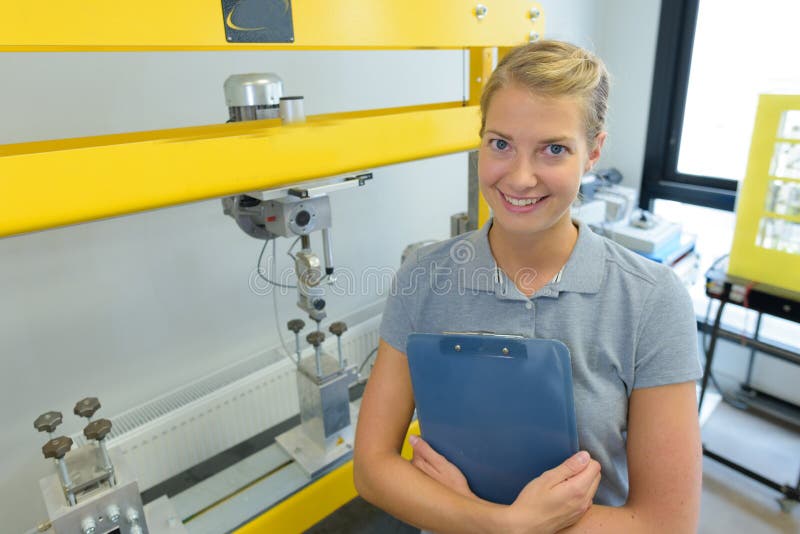 Female Cnc Operator Talking To Colleague Stock Photo - Image of cutting ...