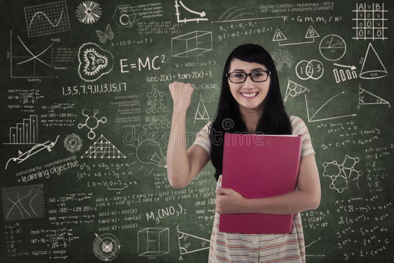 Happy Female Student in Class on Written Board Stock Photo - Image of ...