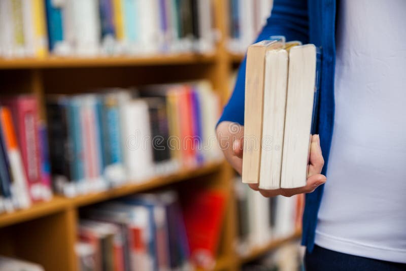 Happy Female Student Taking Books in the Library Stock Photo - Image of ...