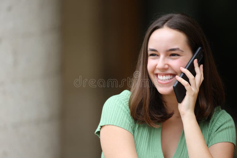 Happy Female is Talking on Phone in the Street Stock Photo - Image of ...