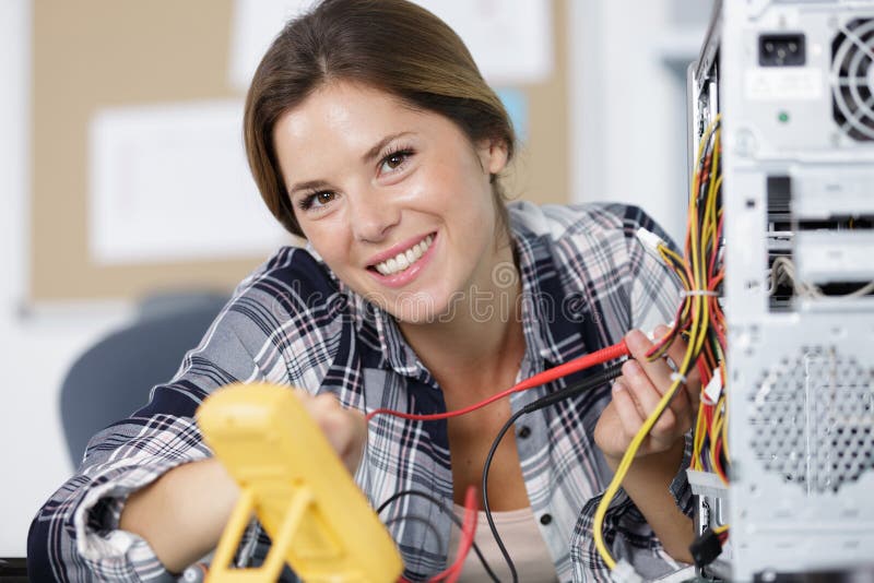 Happy Female Technician Repairing Computer Stock Photo - Image of ...