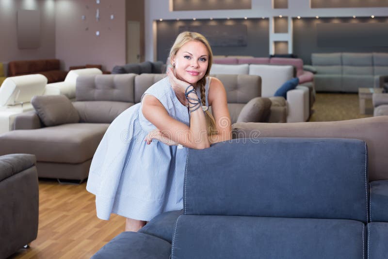 Happy Female is Testing Sofa in Furniture Store Stock Image - Image of ...