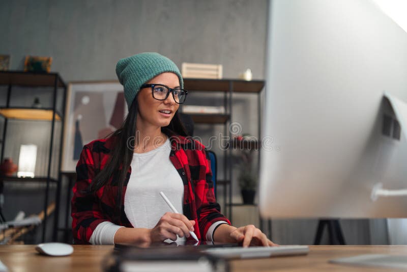 Happy Female Video Editor Works Indoors in Creative Office Studio Stock ...