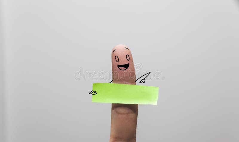 Happy Finger Holding a Green Piece of Paper Stock Image - Image of ...