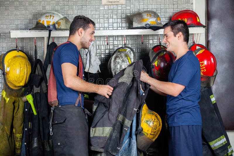 Happy Fireman Standing with Team at Fire Station Stock Image - Image of ...