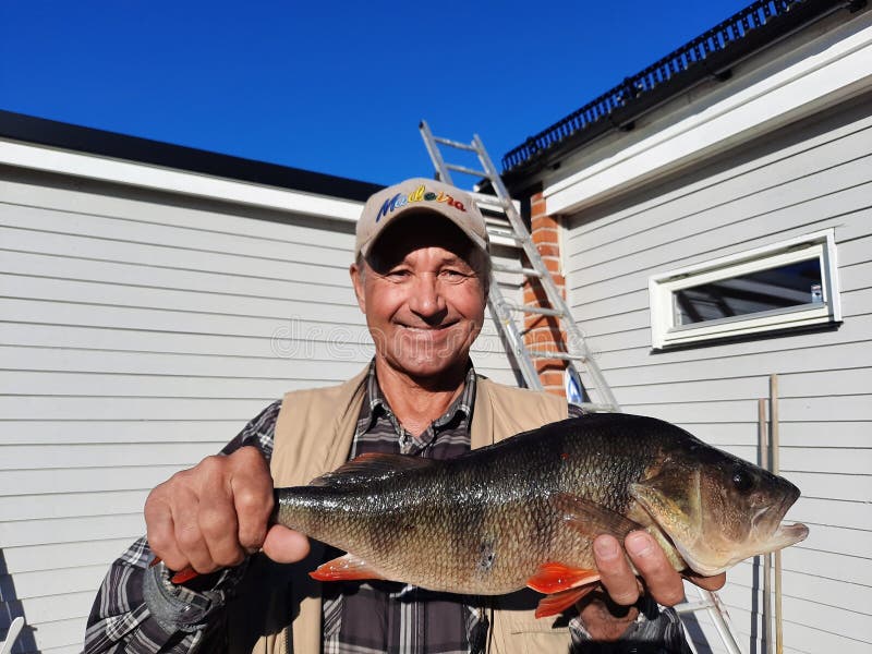 317 Woman Holding Big Fish Stock Photos - Free & Royalty-Free Stock ...