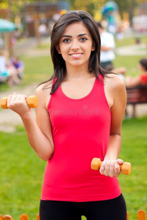 Happy and Fit Girl Working Out with Barbells Stock Image - Image of ...