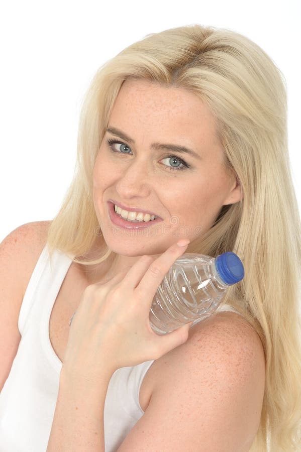 Happy Blonde Haired Cute Young Woman Eating A Roast Vegetable Salad