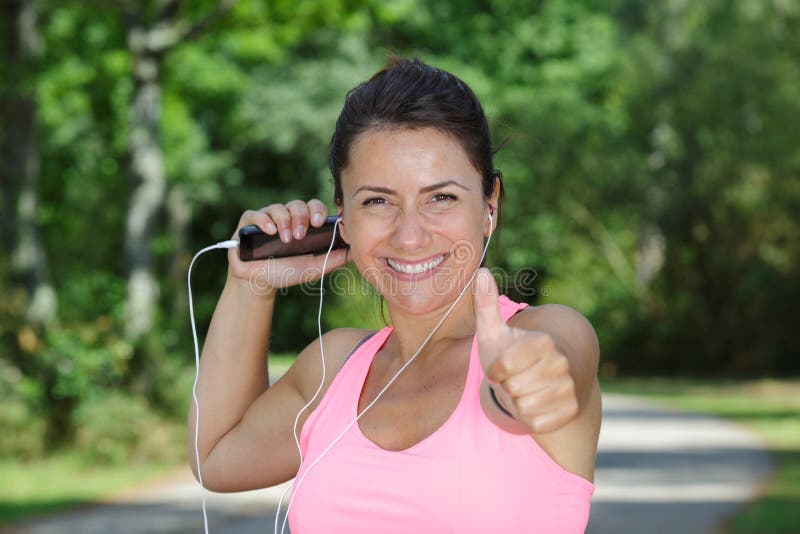 Happy Fit Woman Outdoors with Thumb Up Stock Photo - Image of activity ...