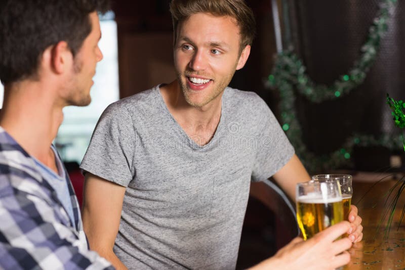 Happy Friends Catching Up Over Pints Stock Photos - Free & Royalty-Free ...
