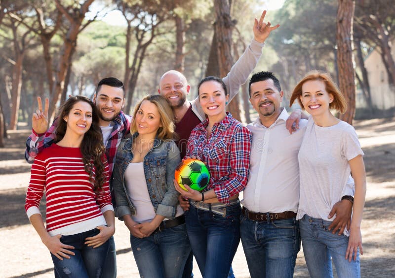 Friends Chasing Each Other in a Sunny Park, Enjoying a Playful and ...