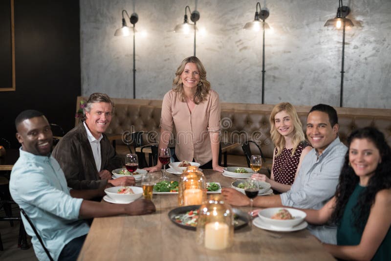 Happy Friends Dining in Restaurant Stock Image - Image of activity ...