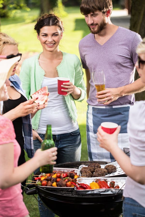 Happy Friends Doing Barbecue Stock Photo - Image of party, male: 56550556