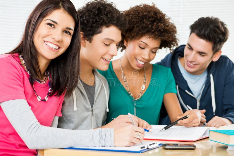 Happy Friends Doing Homework Stock Image - Image of casual, friendship ...