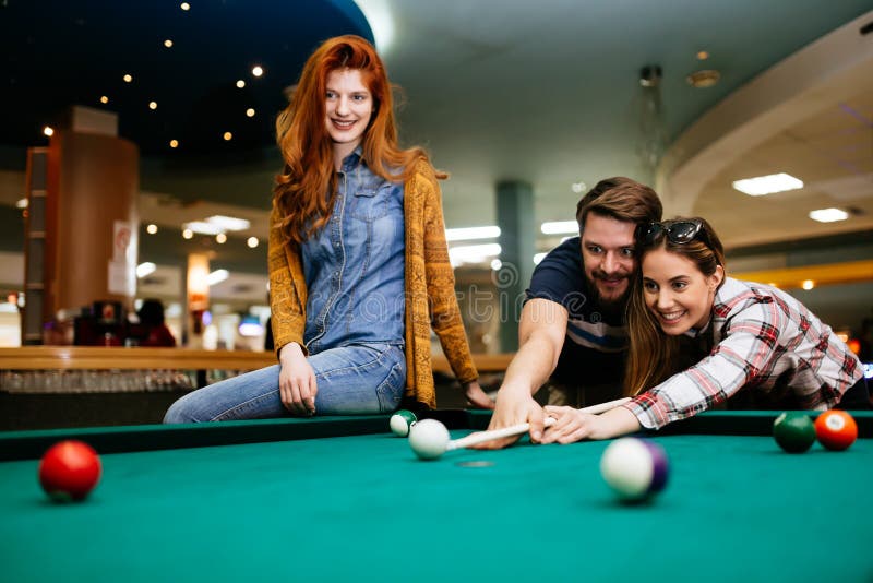 Happy Friends Enjoying Playing Pool Stock Photo - Image of friendship ...