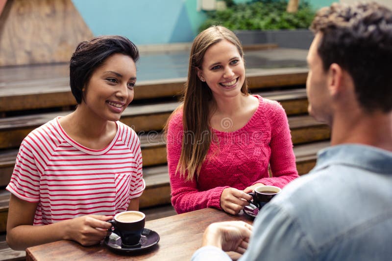 Happy Friends Having Coffee Together Stock Photo - Image of enjoying ...