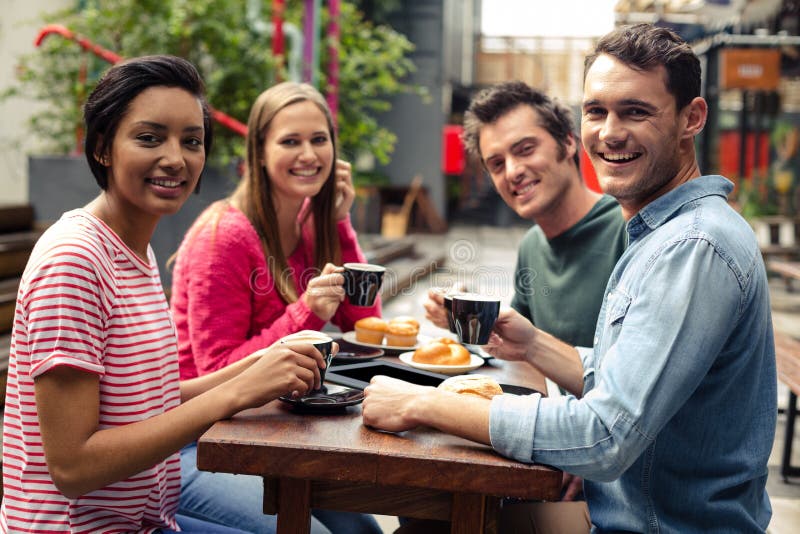 Happy Friends Having Coffee Together Stock Photo - Image of frivolity ...