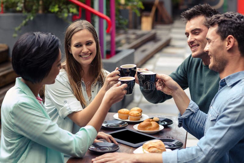 Happy Friends Having Coffee Together Stock Photo - Image of enjoying ...